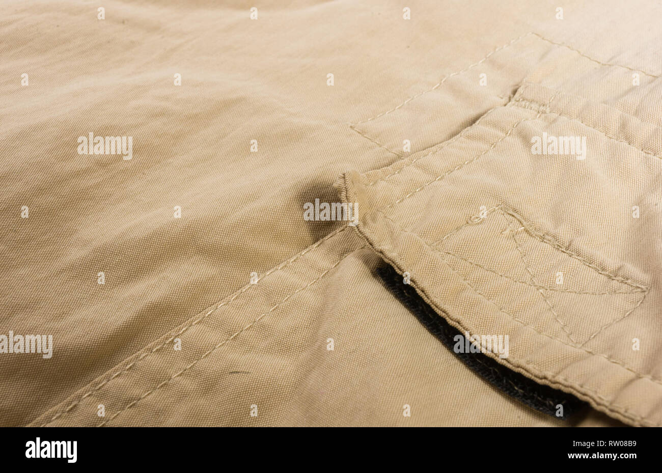 clothing items washed cotton fabric texture with seams, macro, close-up ...