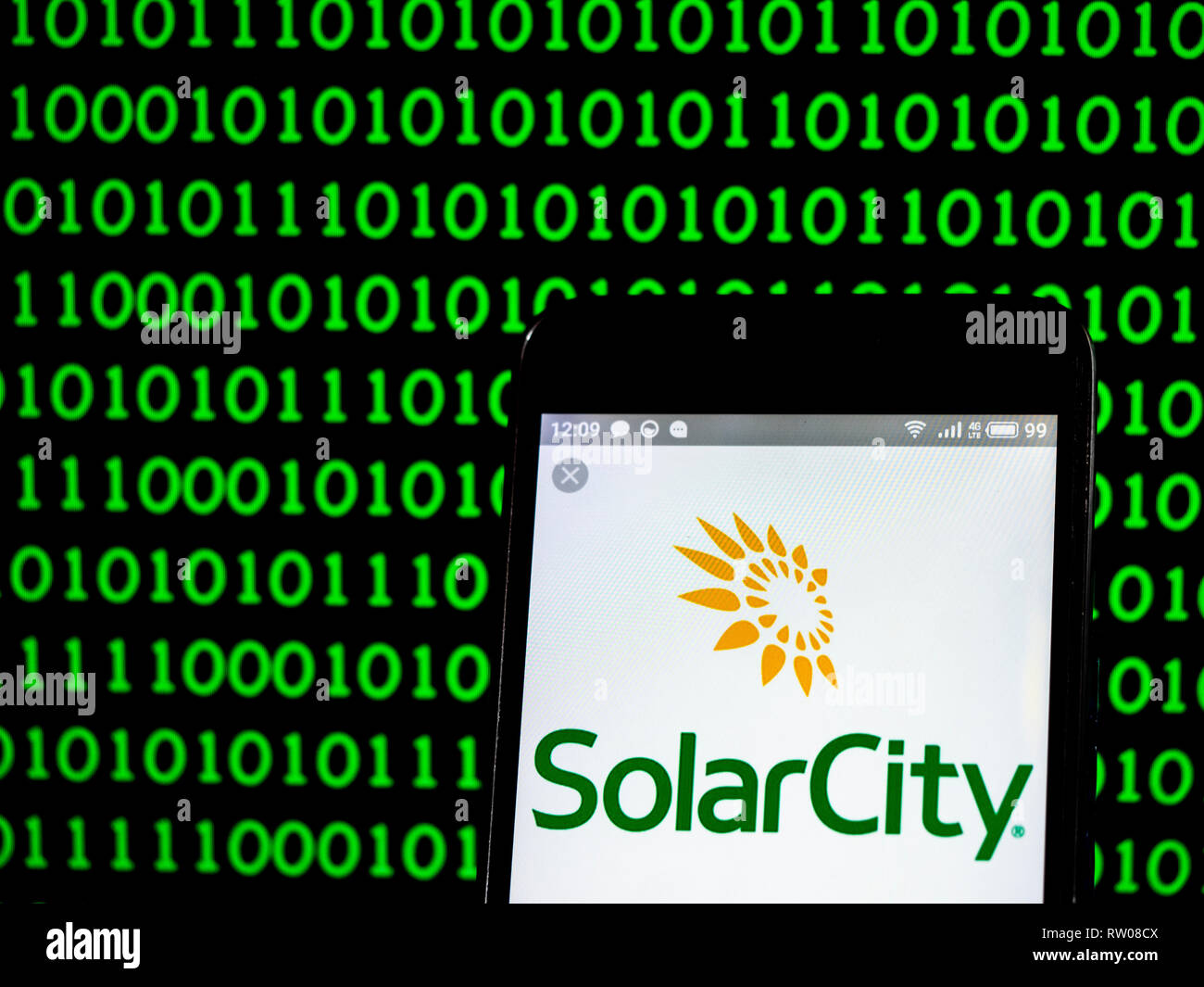 SolarCity energy company logo seen displayed on smart phone Stock Photo ...