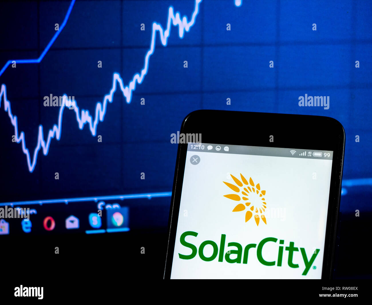 SolarCity energy company logo seen displayed on smart phone Stock Photo ...