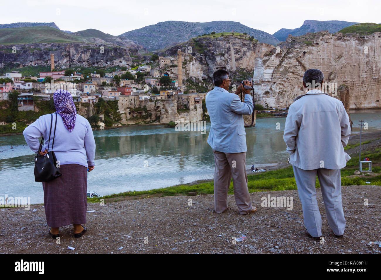 Hasankeyf, Batman province, Turkey : Turkish tourists stand opposite ...