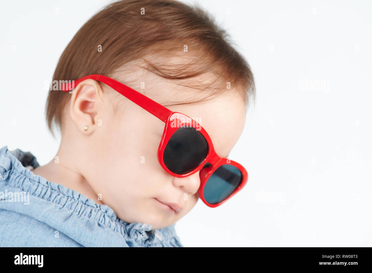 Looking down baby in sunglasses isolated on white background Stock ...