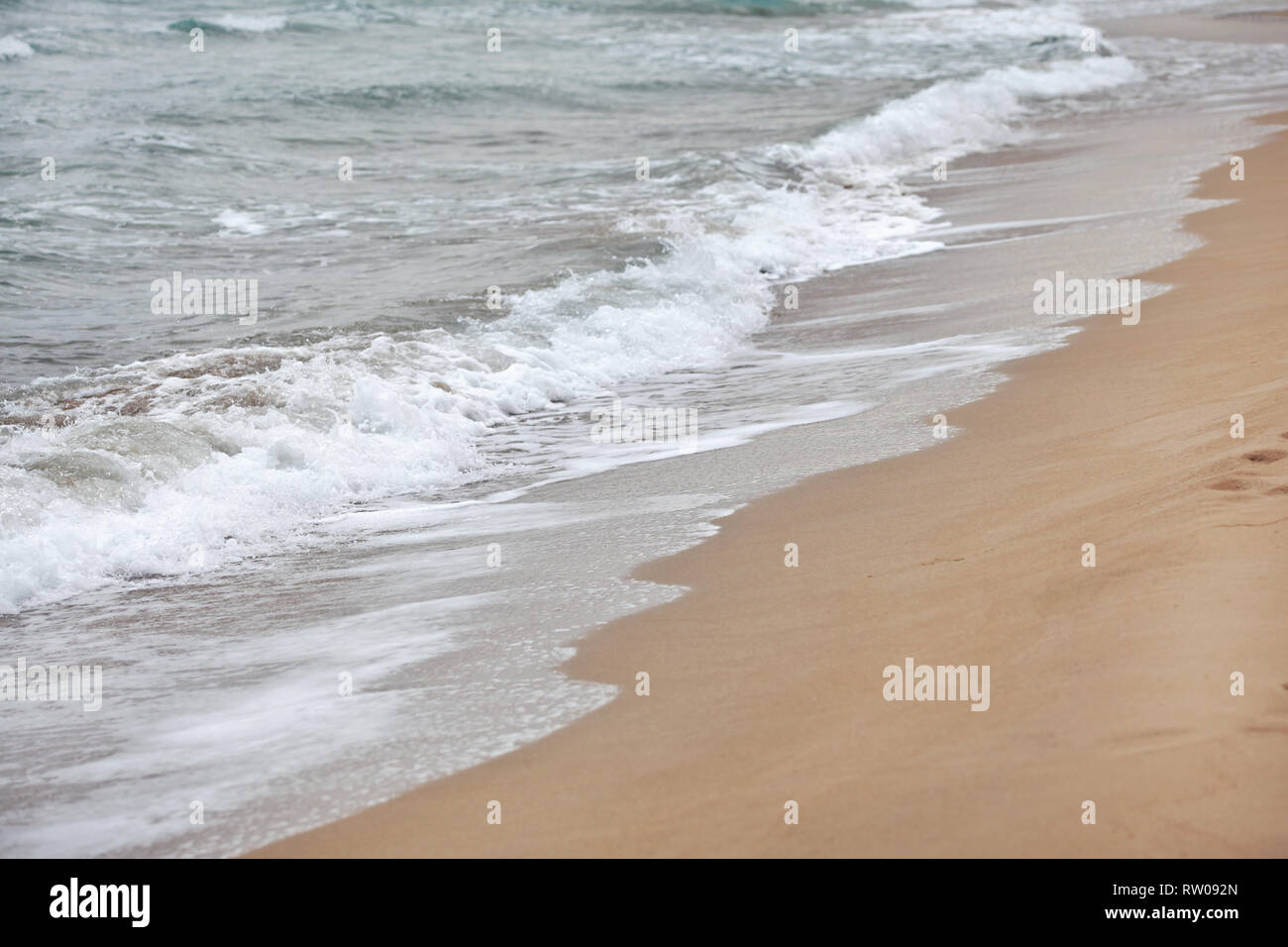 Clear calm water seashore washing hi-res stock photography and images ...