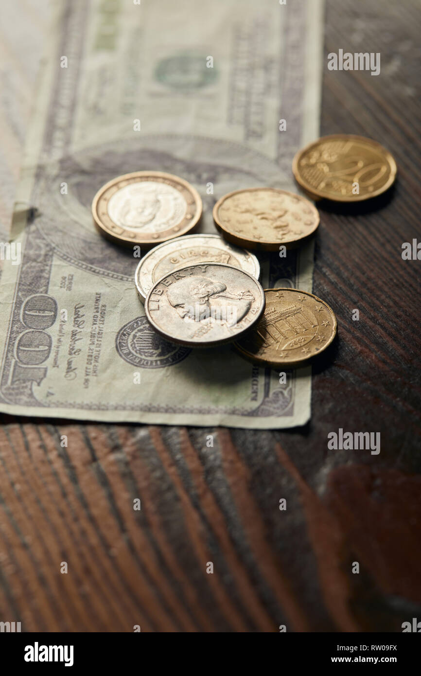 dollar banknote and coins on wooden table with copy space Stock Photo ...
