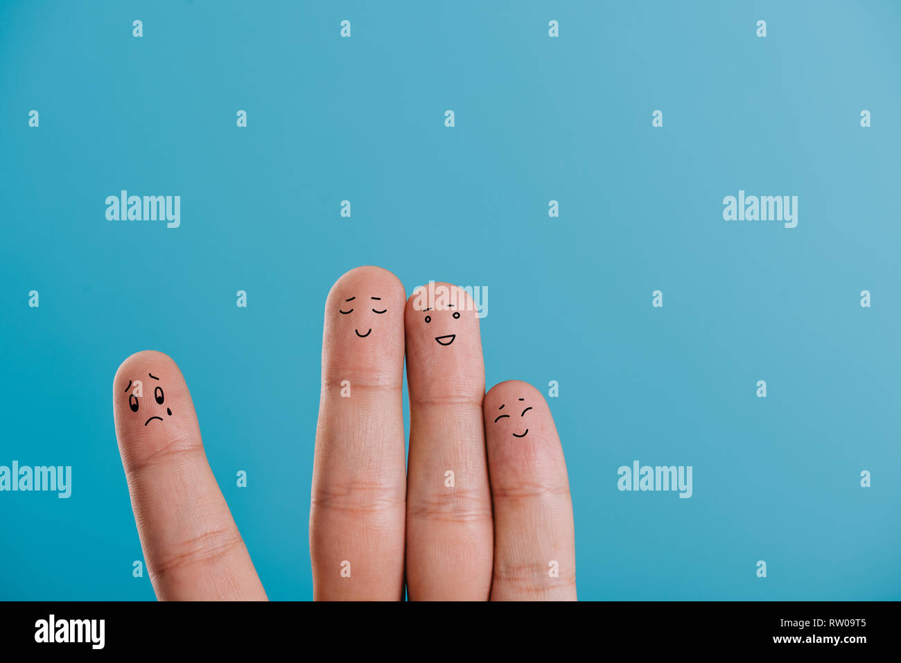 Happy fingers one sad hi-res stock photography and images - Alamy