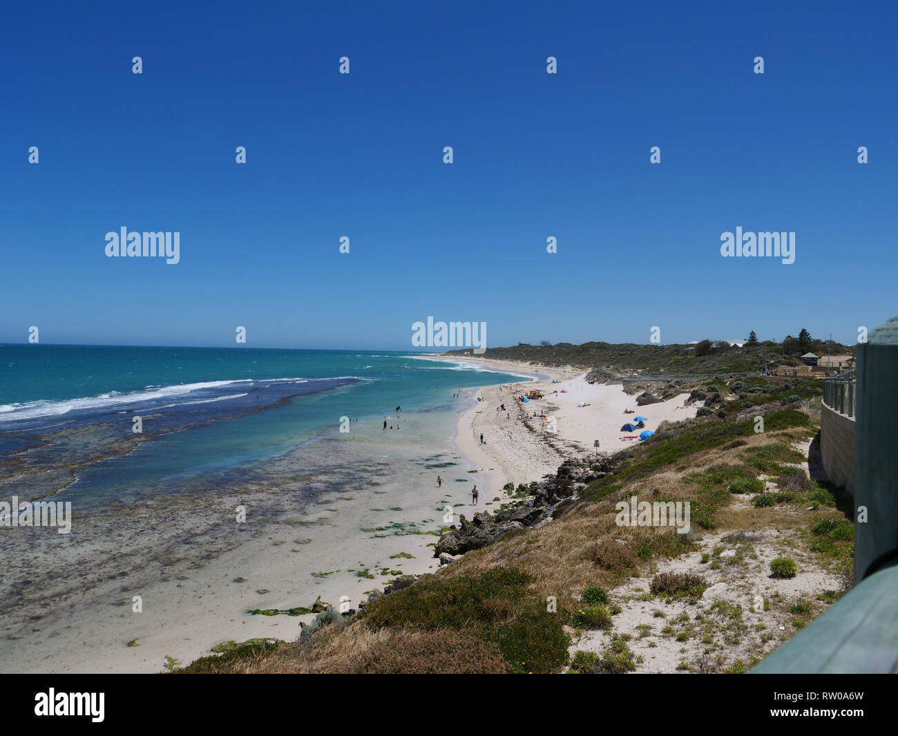 Beach of Yanchep, WA, Australia, with white sand, blue sea and sky, and ...