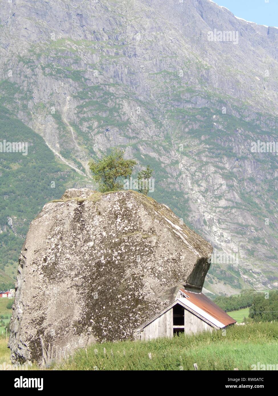 Boulder used as roof for barn, Jolster, Sogn og Fjordane, Norway Stock ...