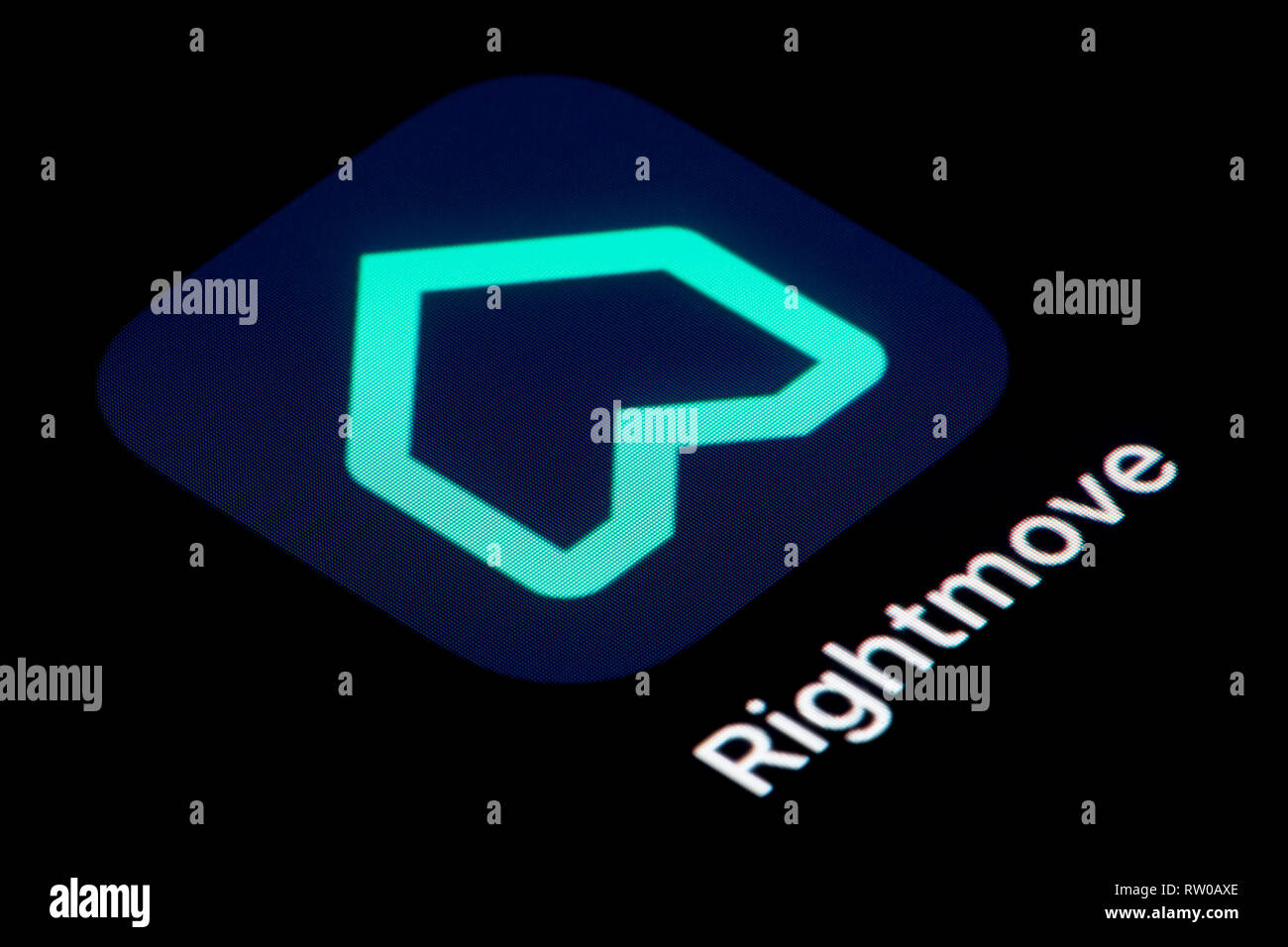 A close-up shot of the Rightmove app icon, as seen on the screen of a ...