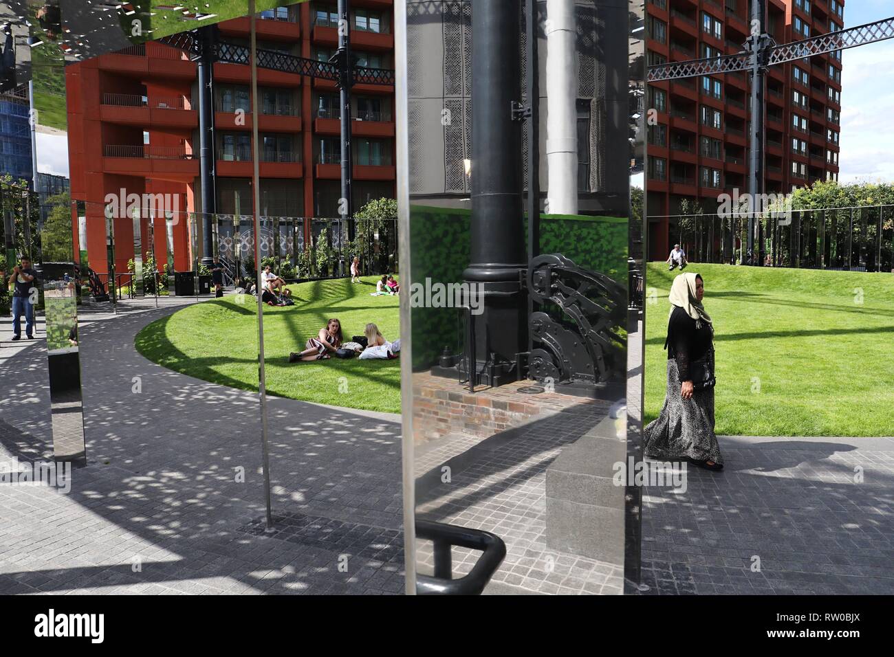 Victorian gas holder encloses new park in King's Cross, London Stock ...