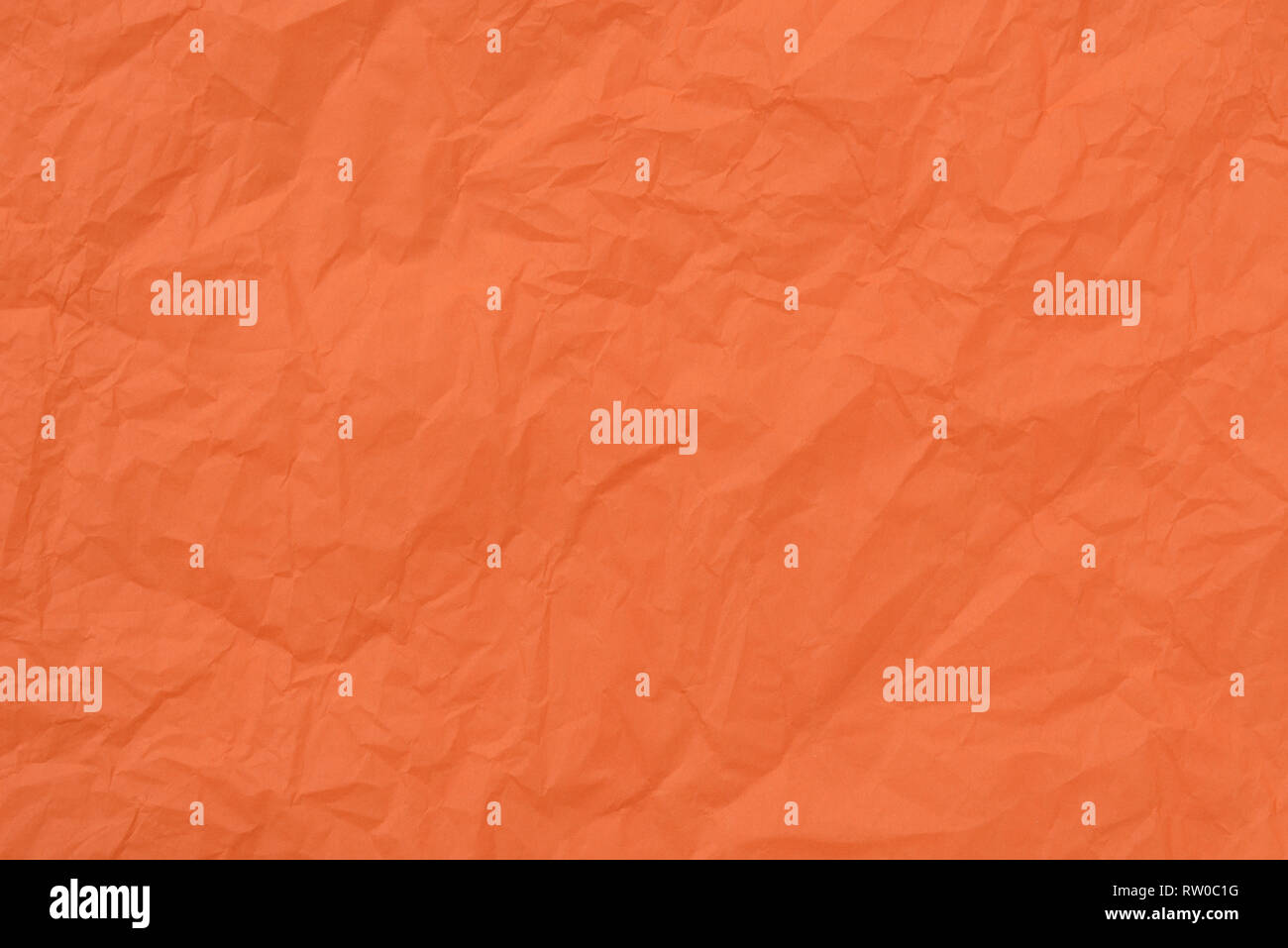 creased orange color tissue paper texture background Stock Photo - Alamy