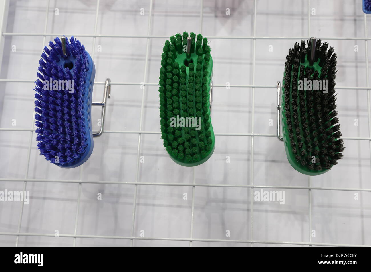 plastic cleaning brushes in supermarket hanger ; close up Stock Photo ...