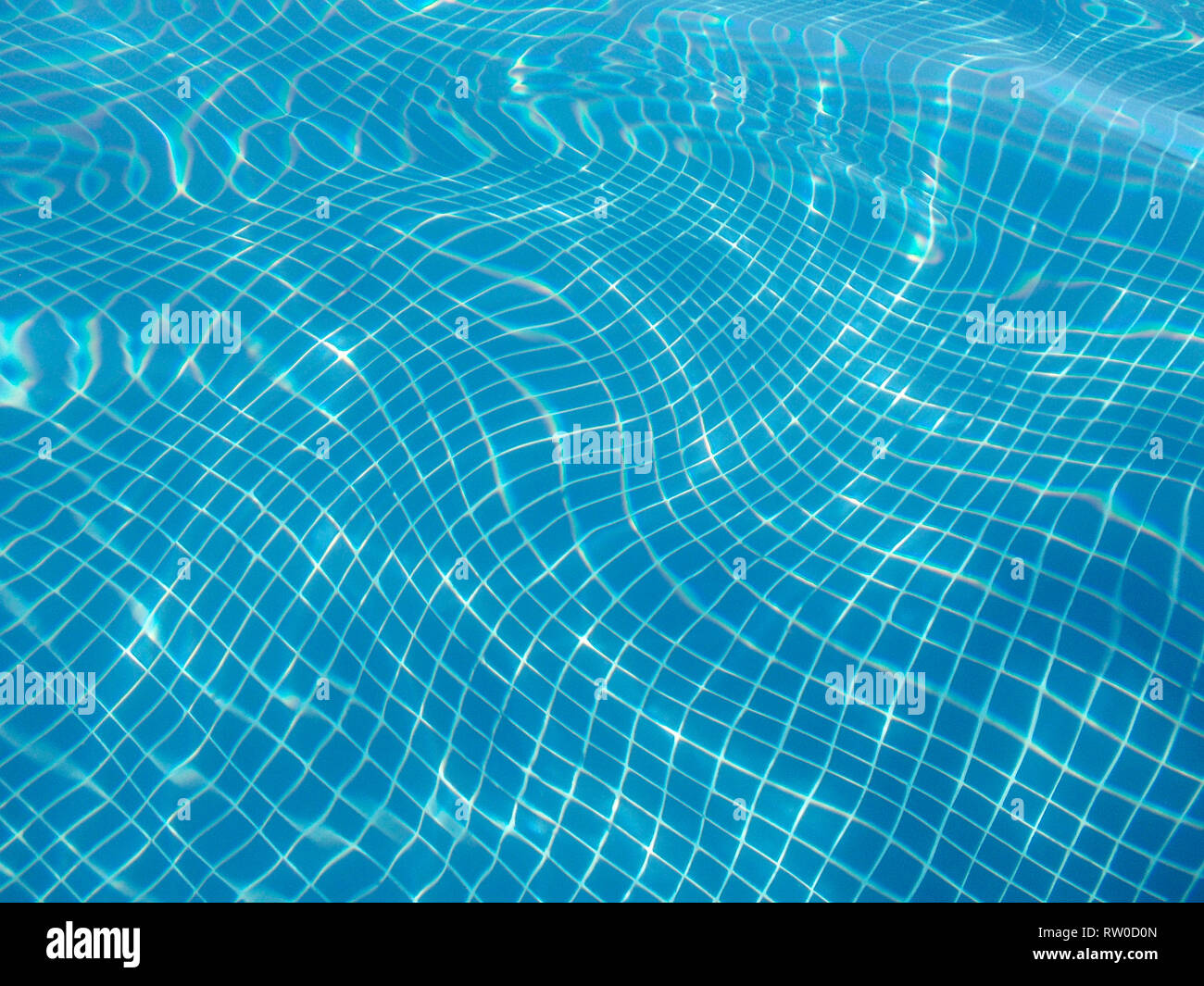 Water reflections on a swimming pool. Underwater photography ...