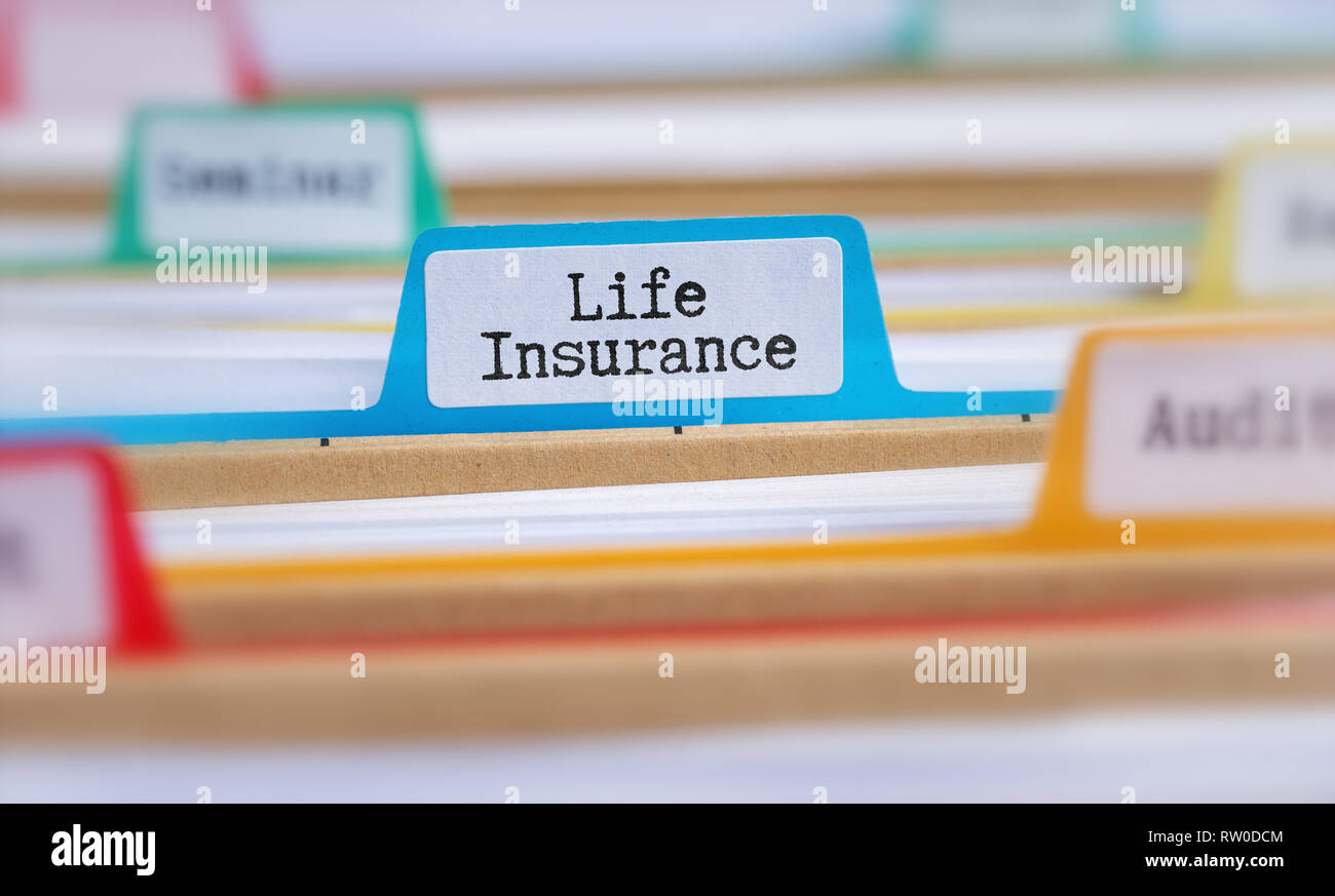 File folders with a tab labeled Life Insurance Stock Photo - Alamy