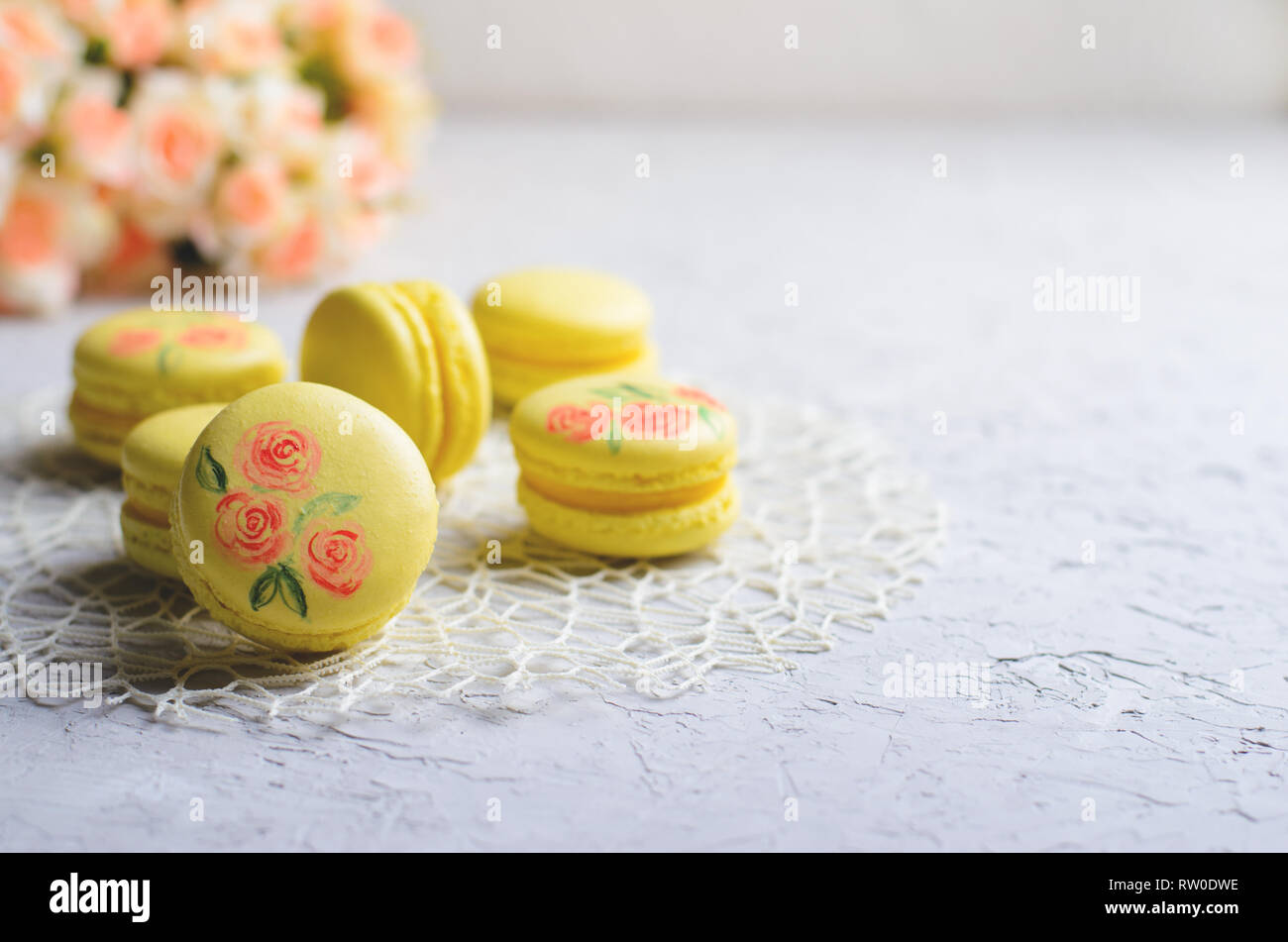 Macarons Handmade Dessert, French Sweets on Grey Background and Roses ...