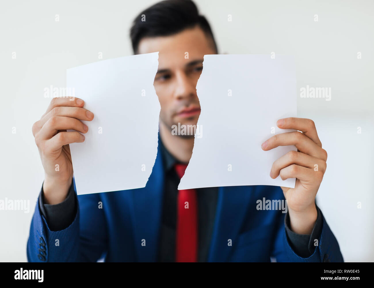 Man ripping paper hi-res stock photography and images - Alamy