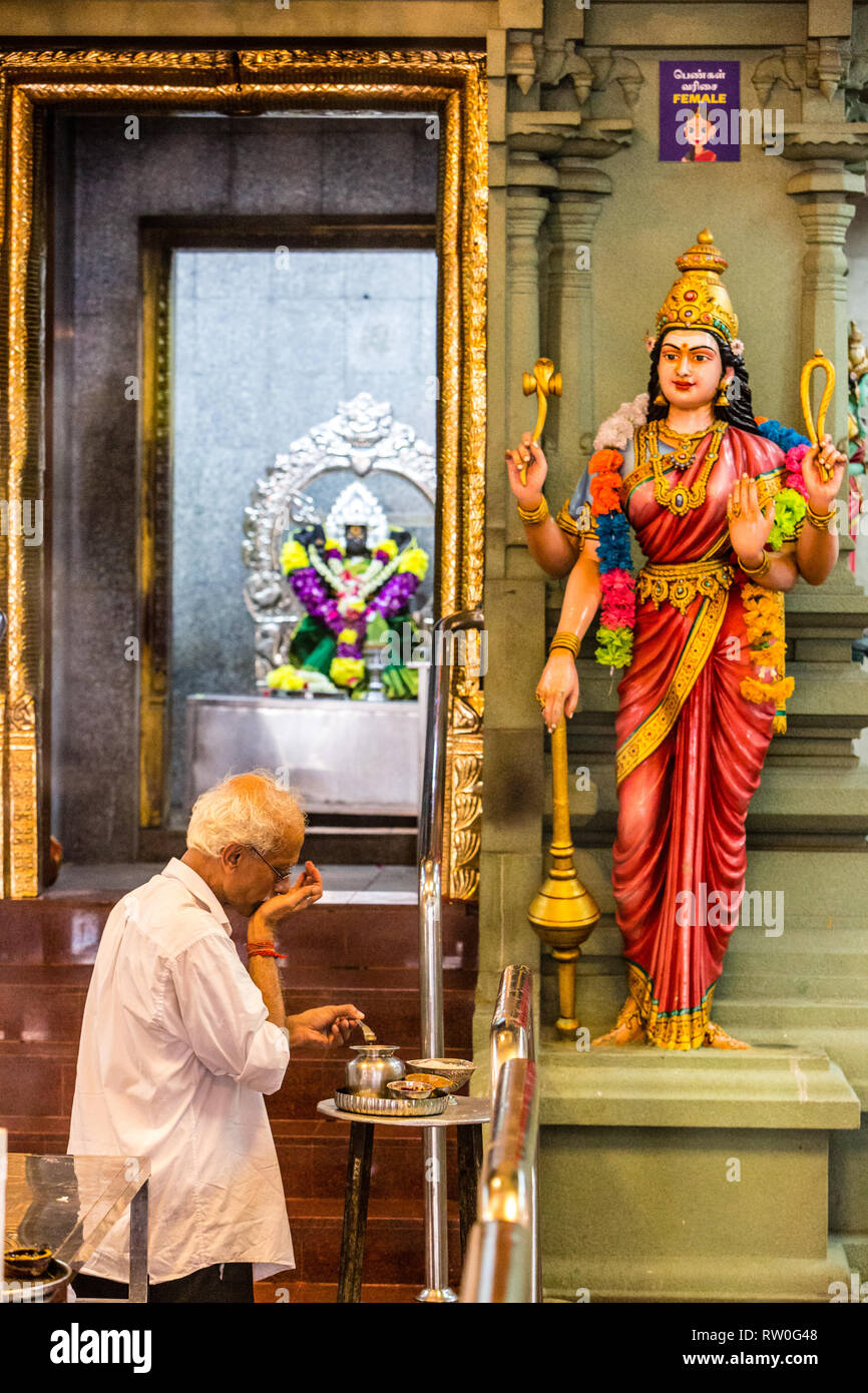 Worshiper outside Inner Shrine, Sri Mahamariamman Hindu Temple, Kuala ...