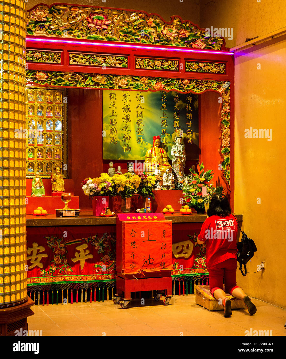Woman Praying in a Side Altar in Guan Di (Kuan Ti) Taoist Temple ...