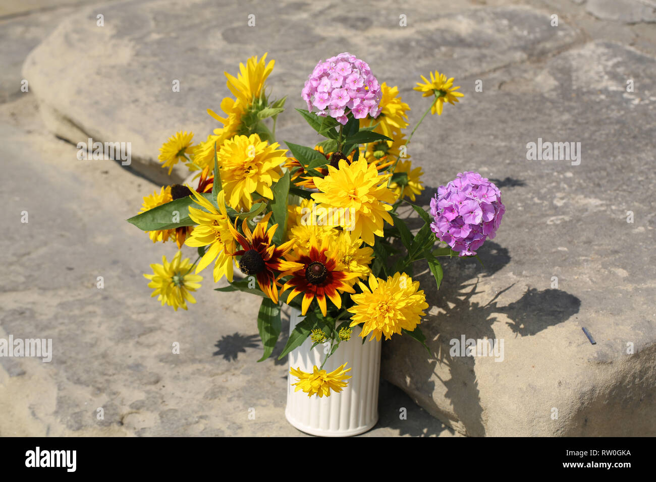 the beautiful bouquet from sunflowers, hydrangeas and chrysanthemums ...