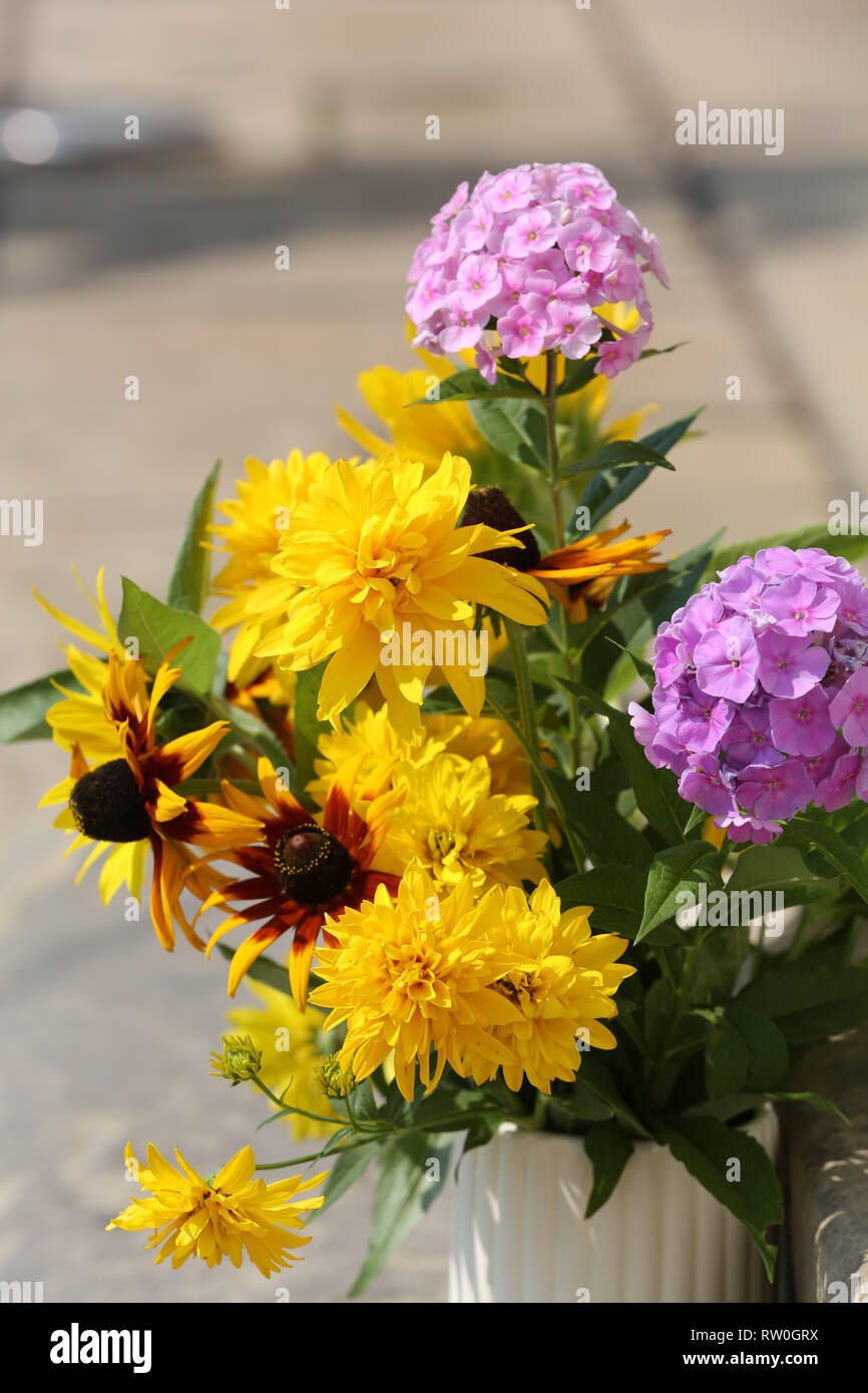 the beautiful bouquet from sunflowers, hydrangeas and chrysanthemums ...