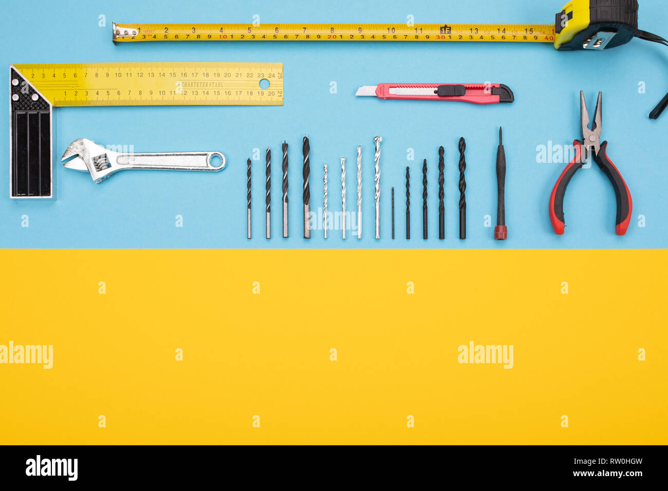 Different construction kit are hanging on background Stock Photo - Alamy