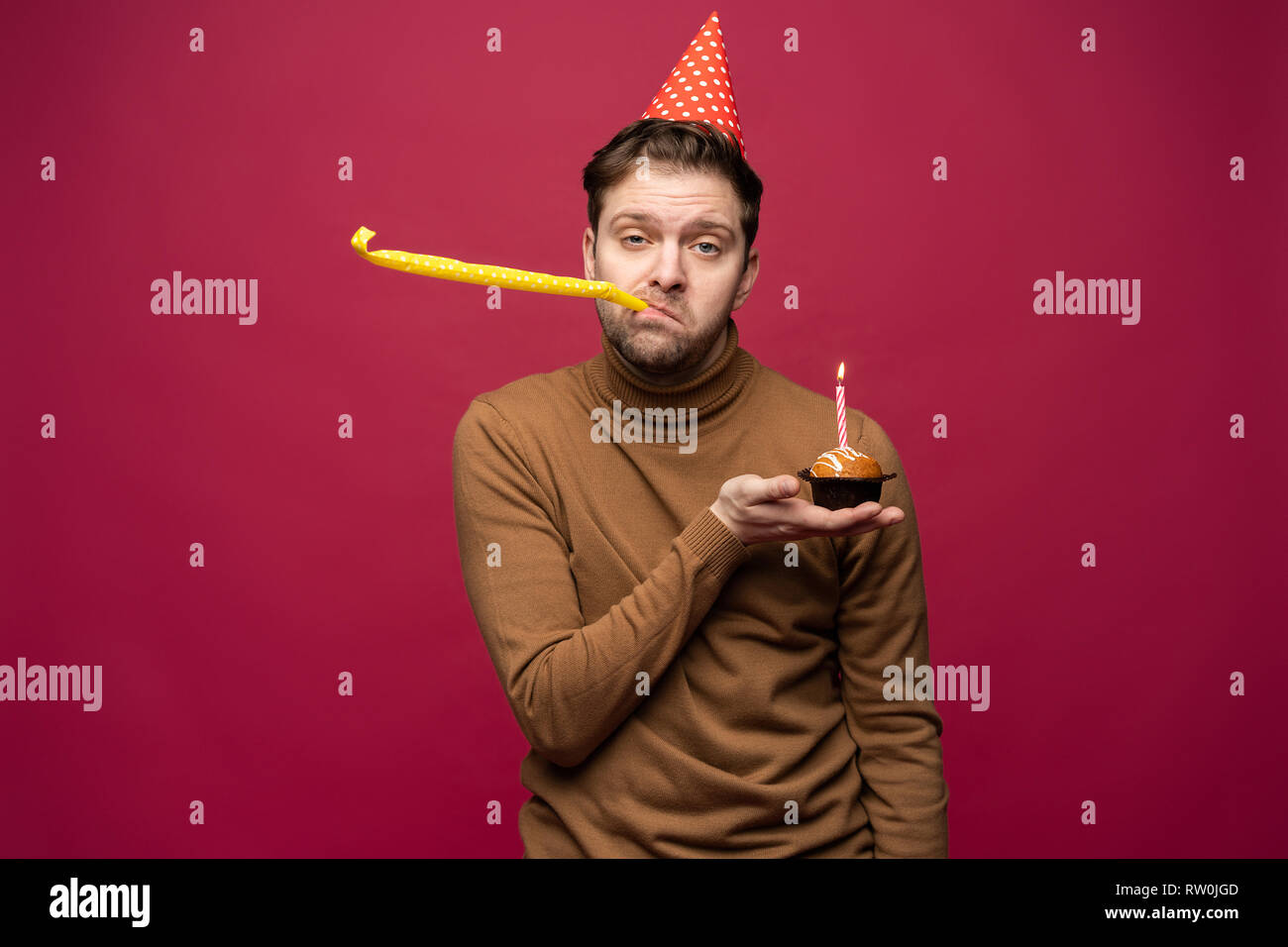 Picture of unhappy stressed young man having unhappy look, feeling ...