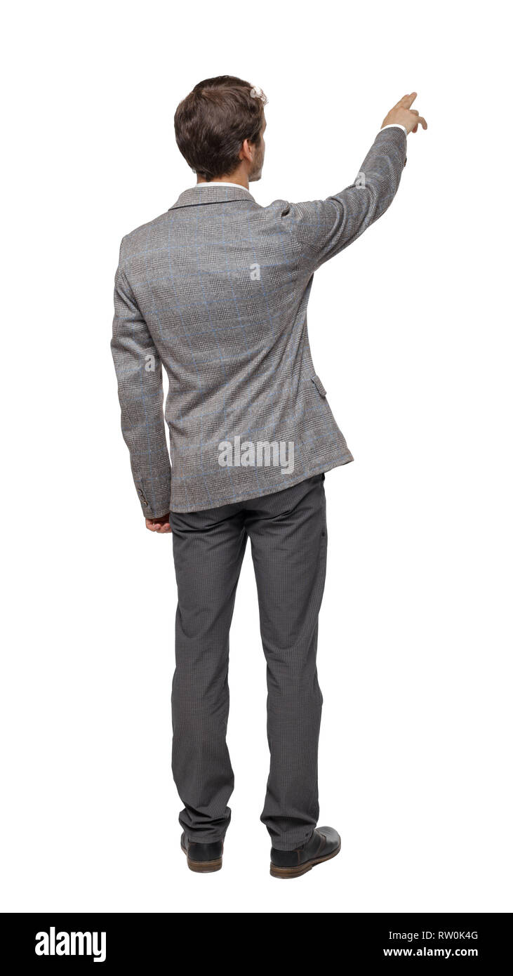 Back view of pointing business man. gesticulating young guy in black ...
