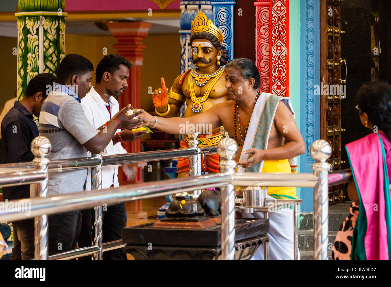 Batu Caves, Worshipers Awaiting Blessing by Priest, Selangor, Malaysia ...