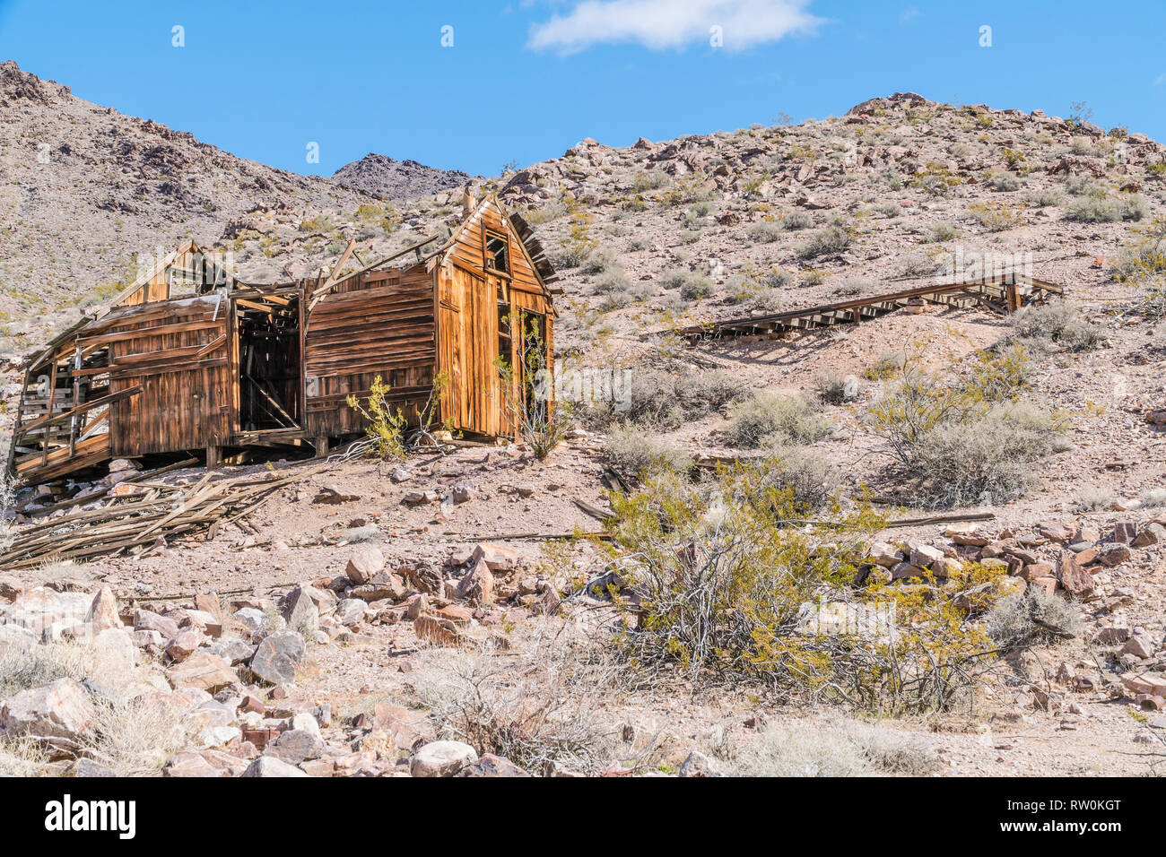 A wooden house with a collapsed roof at the Inyo Mine ruins in Death ...