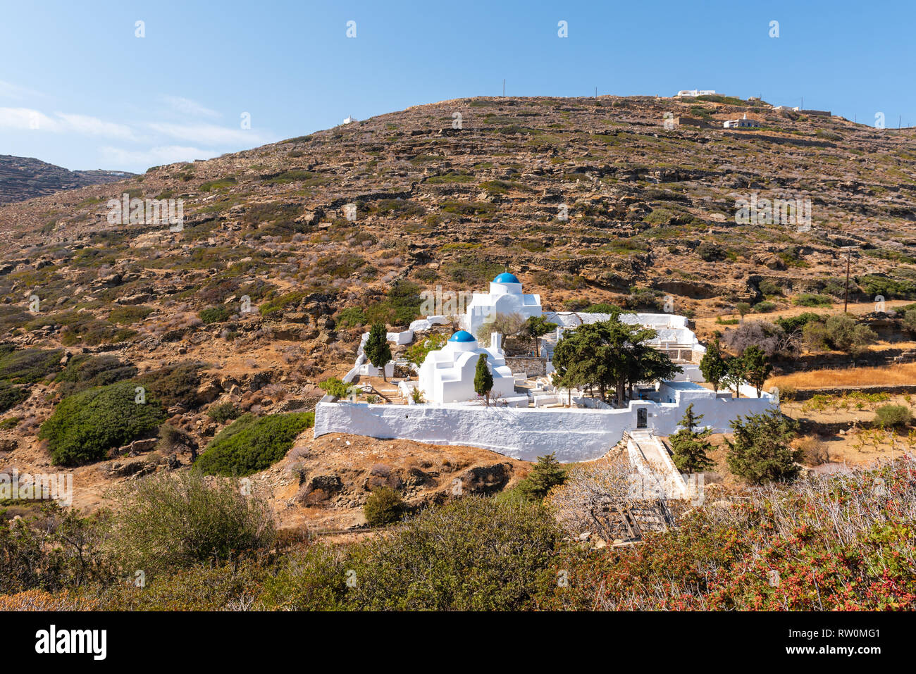 White churches with blue domes in the cemetery under Kastro of Sifnos ...