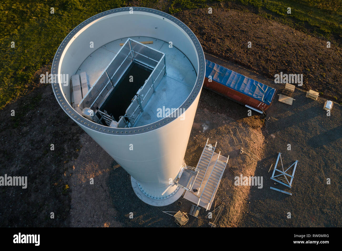 Aerial image looking down the shaft of a partially built wind turbine ...
