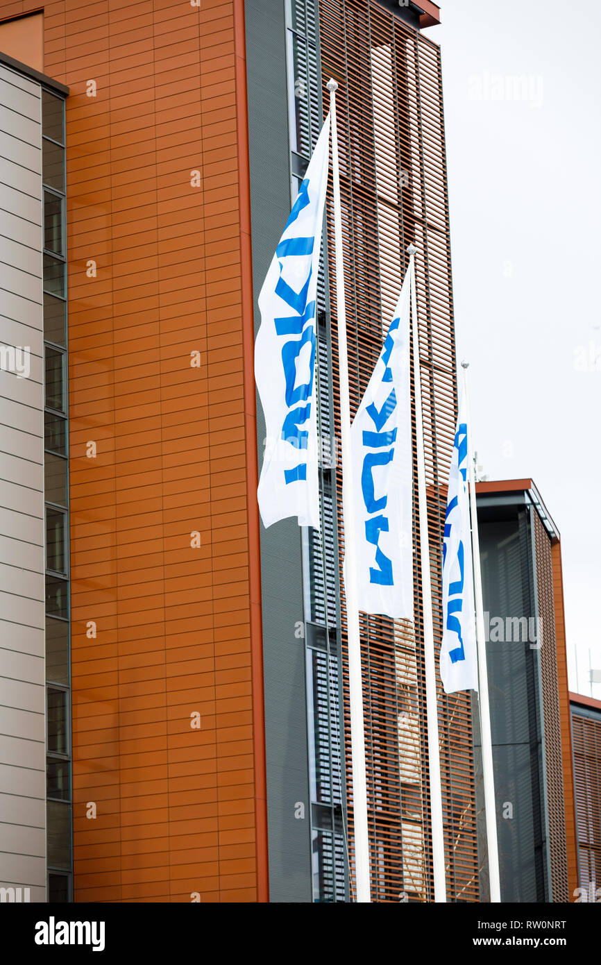 ESPOO, FINLAND - MARCH 03, 2019: White flags with Nokia company name ...