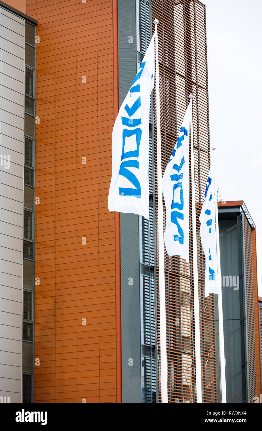 ESPOO, FINLAND - MARCH 03, 2019: White flags with Nokia company name ...