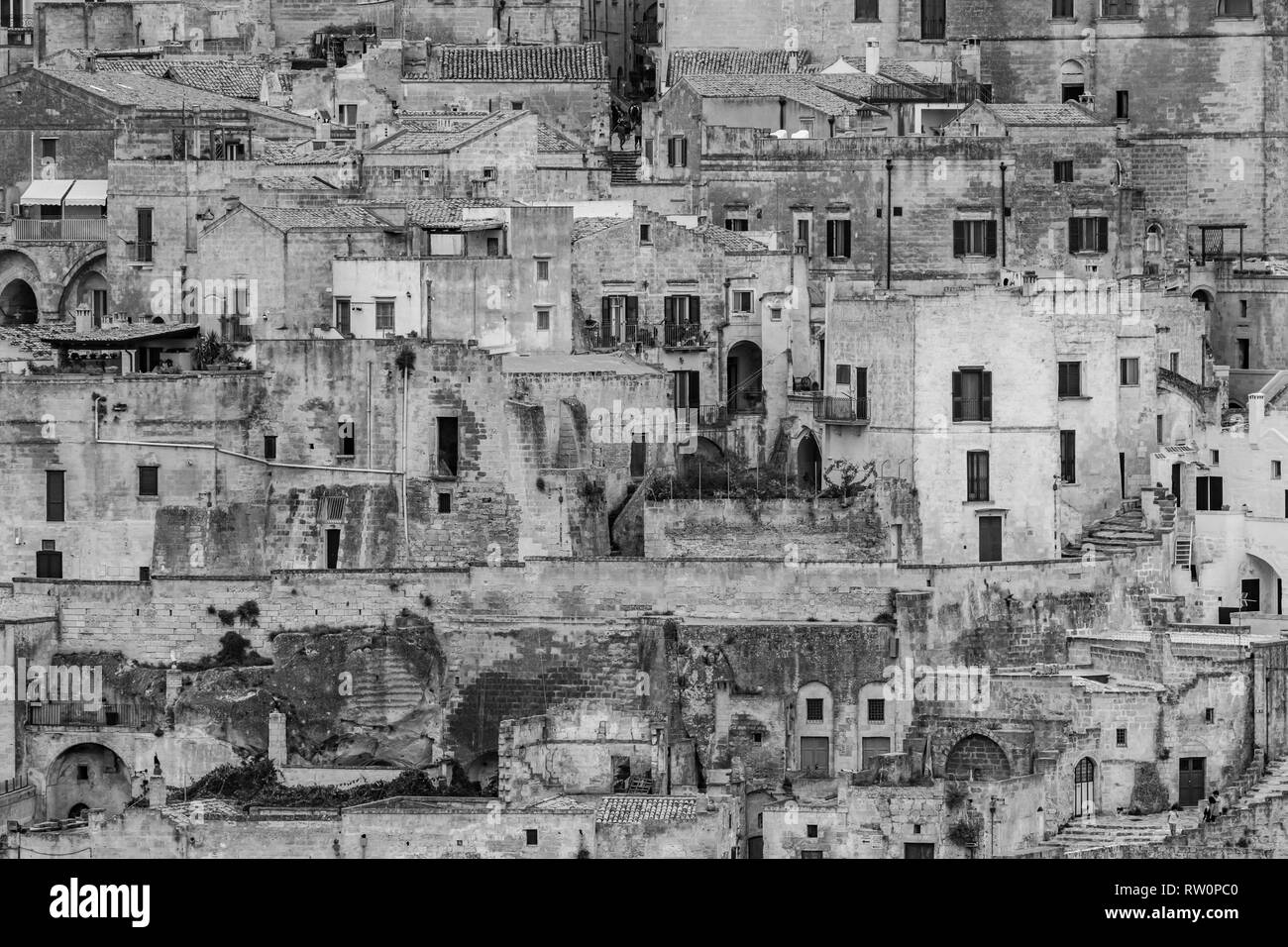 MATERA, ITALY - AUGUST 26, 2018: Tourists and local people look very ...