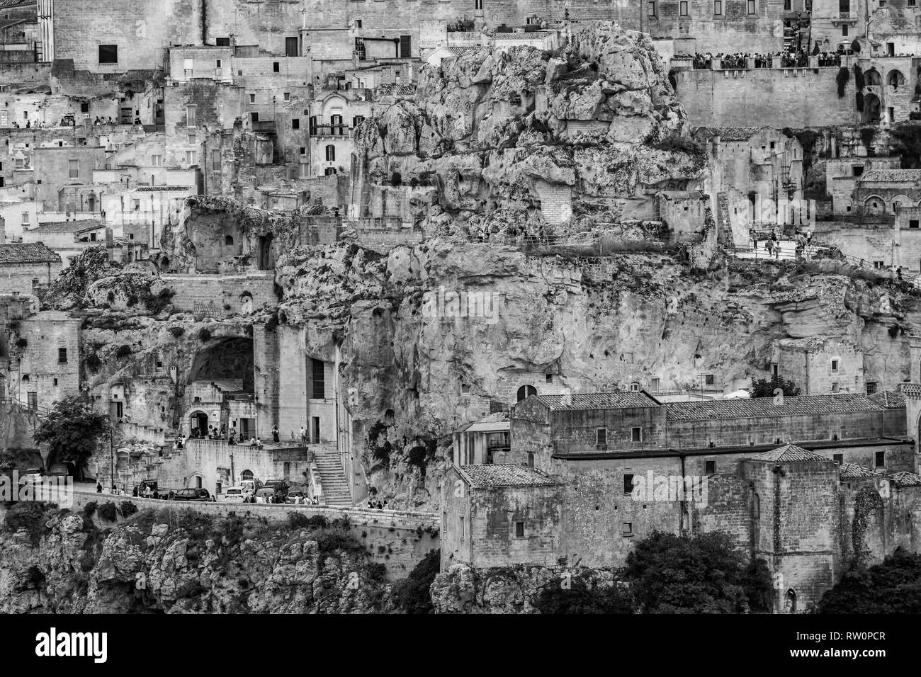 MATERA, ITALY - AUGUST 26, 2018: Tourists and local people look very ...