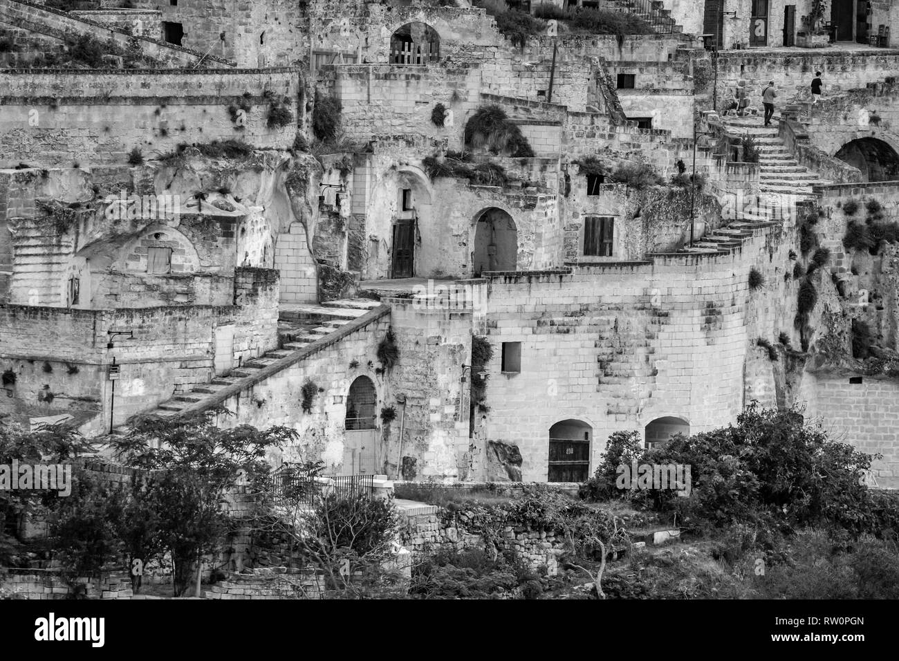 MATERA, ITALY - AUGUST 26, 2018: Tourists and local people look very ...
