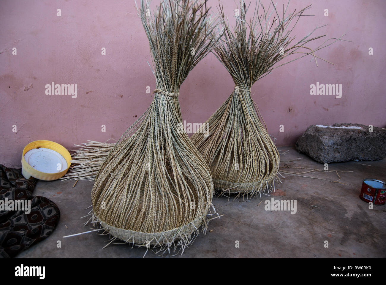 A photo of two beautiful Bolga handwoven market baskets in preparation ...