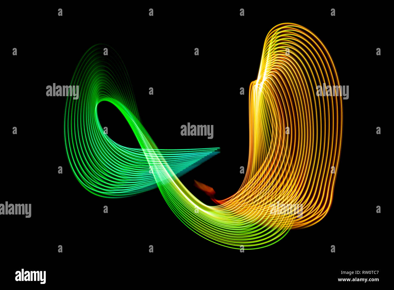Colorful blue, yellow, green and orange neon spiral lines.Abstract background of blue neon ...