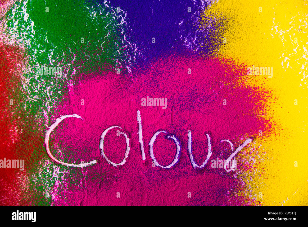 Color word on colorful color powder Stock Photo - Alamy