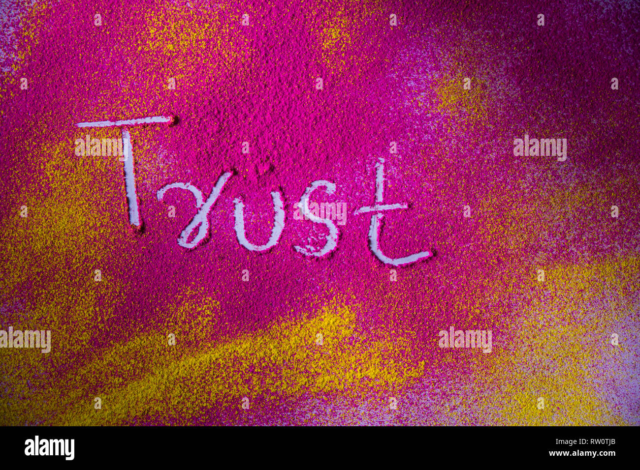 Colorful Powder written word Trust Stock Photo - Alamy