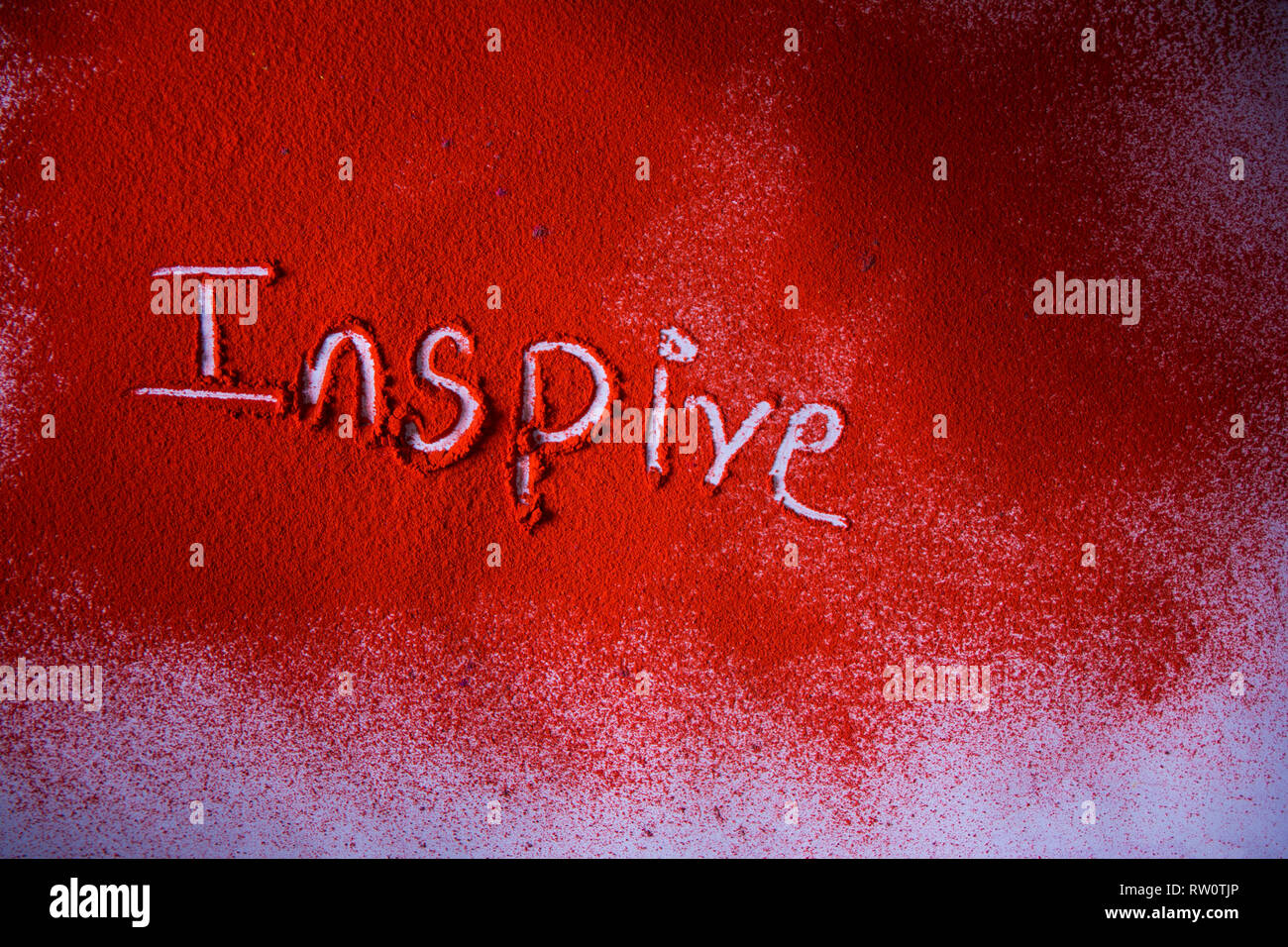 Colorful Powder written word Inspire Stock Photo - Alamy