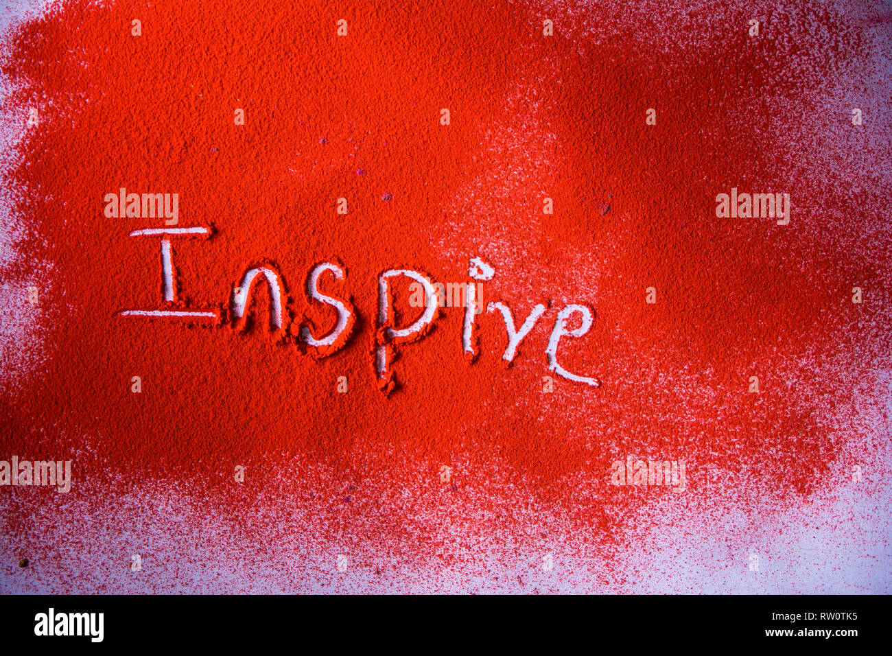 Colorful Powder written word Inspire Stock Photo - Alamy