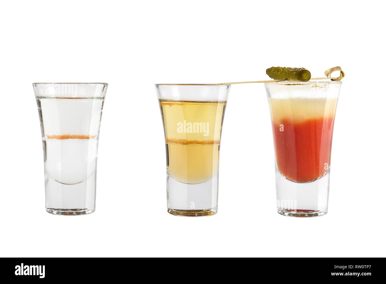 Set of alcohol shots on a white background. Three different shots ...