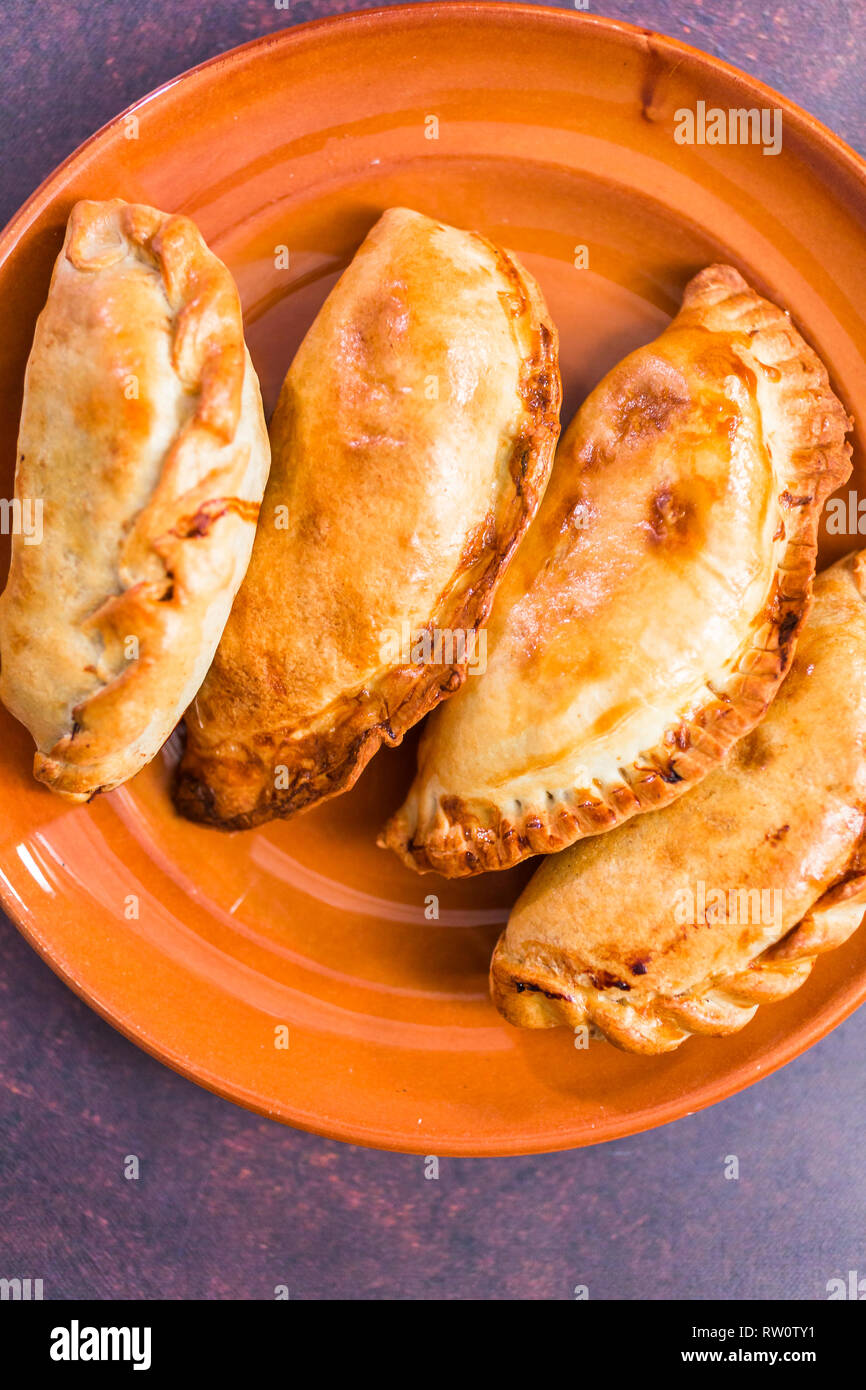 Homemade large empanadas with different staffings Stock Photo - Alamy