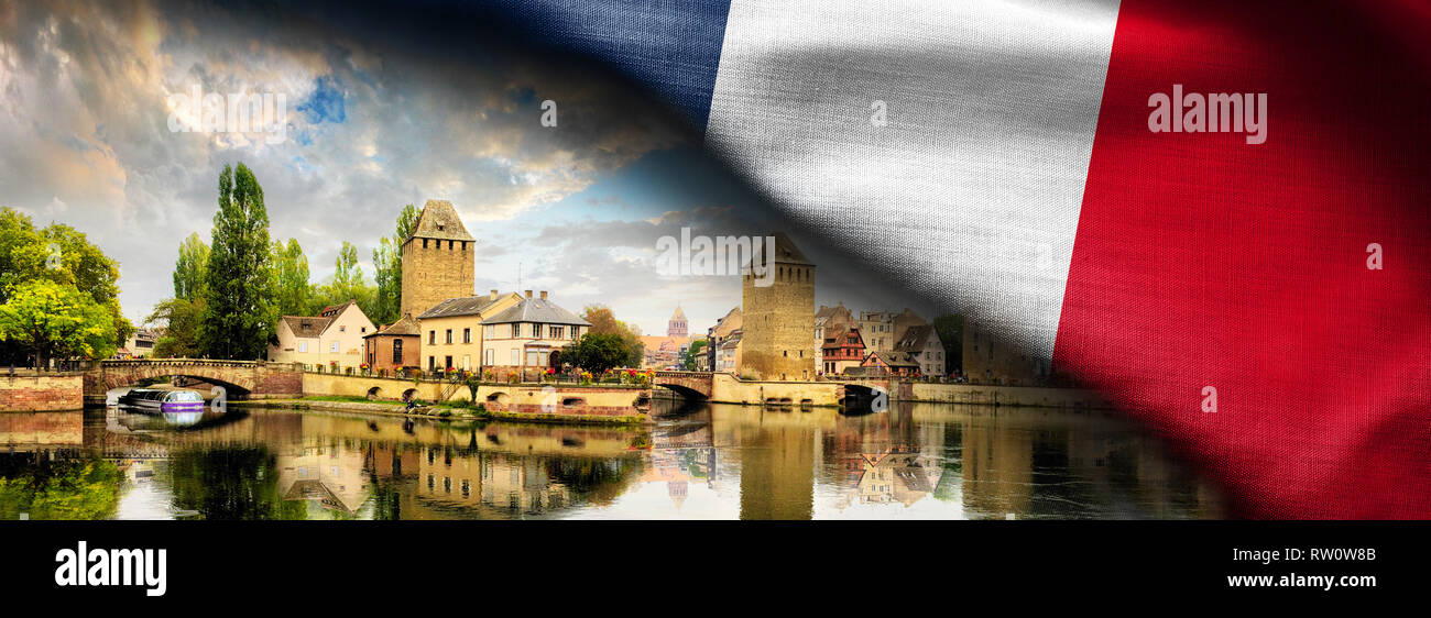 Fabric Flag of france and Strasbourg cityscape, Alsace, France ...