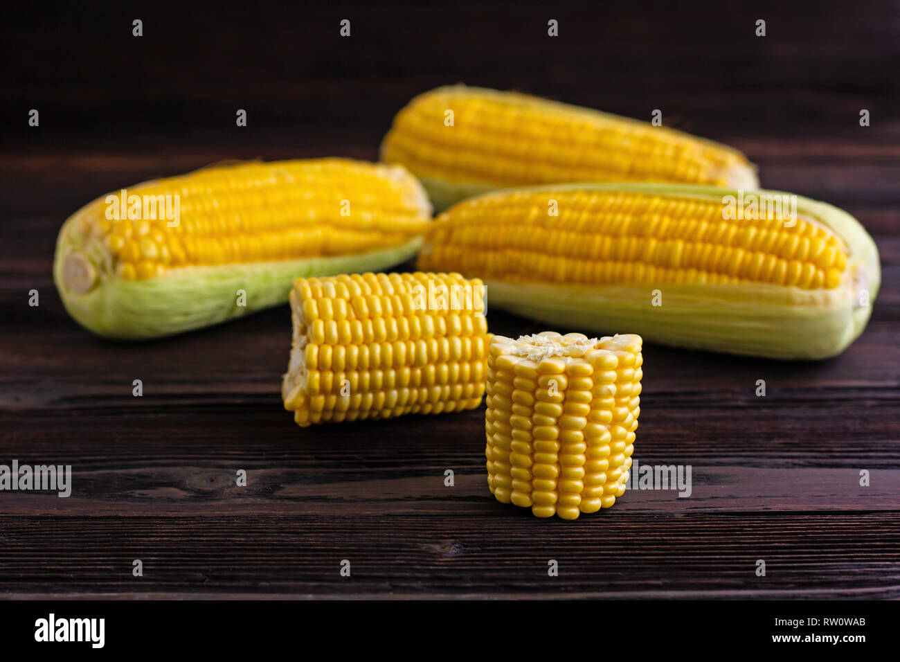 Sweet Corn on wooden table background Stock Photo - Alamy