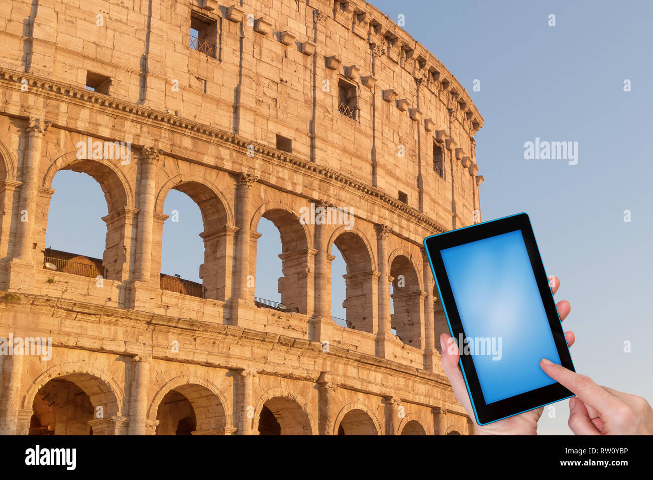 Female finger touching tablet with blank screen ready for your text ...