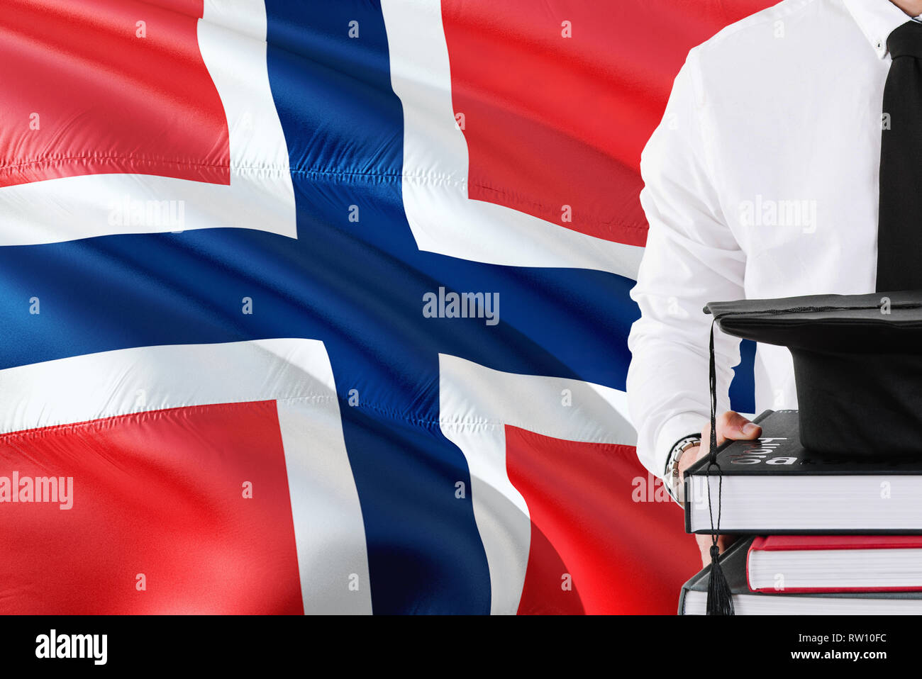 Successful Norwegian student education concept. Holding books and ...