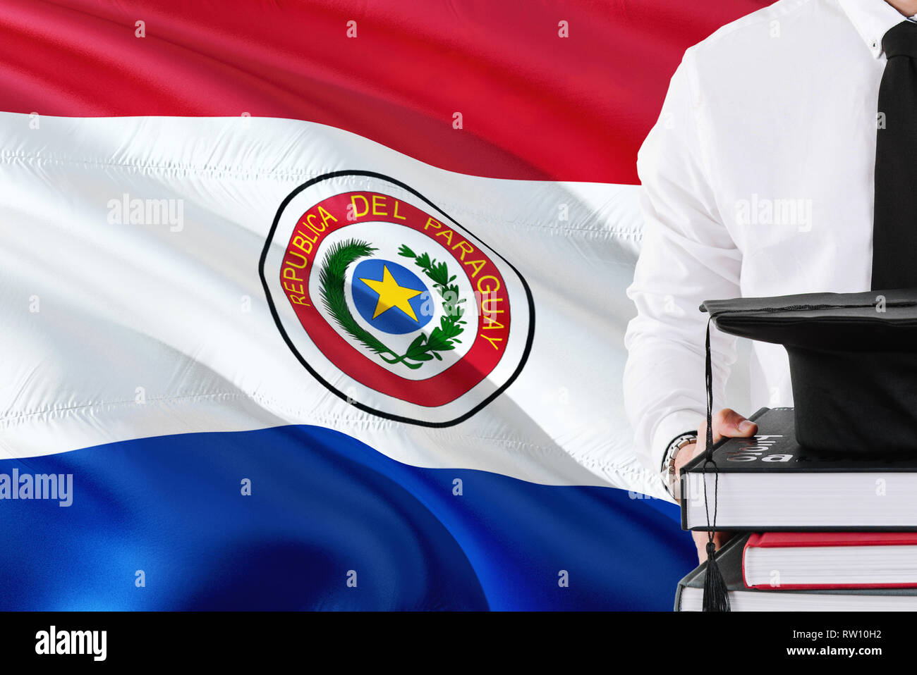 Successful Paraguayan student education concept. Holding books and ...