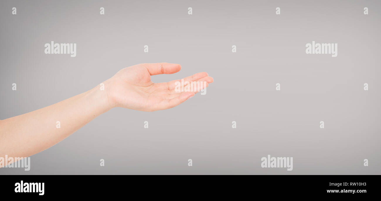 open Female hand on grey background copy space Stock Photo - Alamy