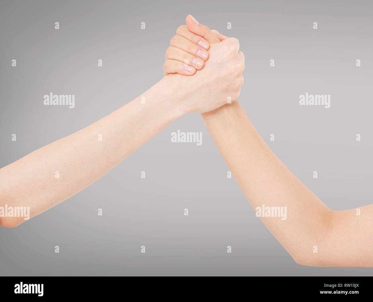 female Hand and arm pulling up isolated on grey background. The Concept ...