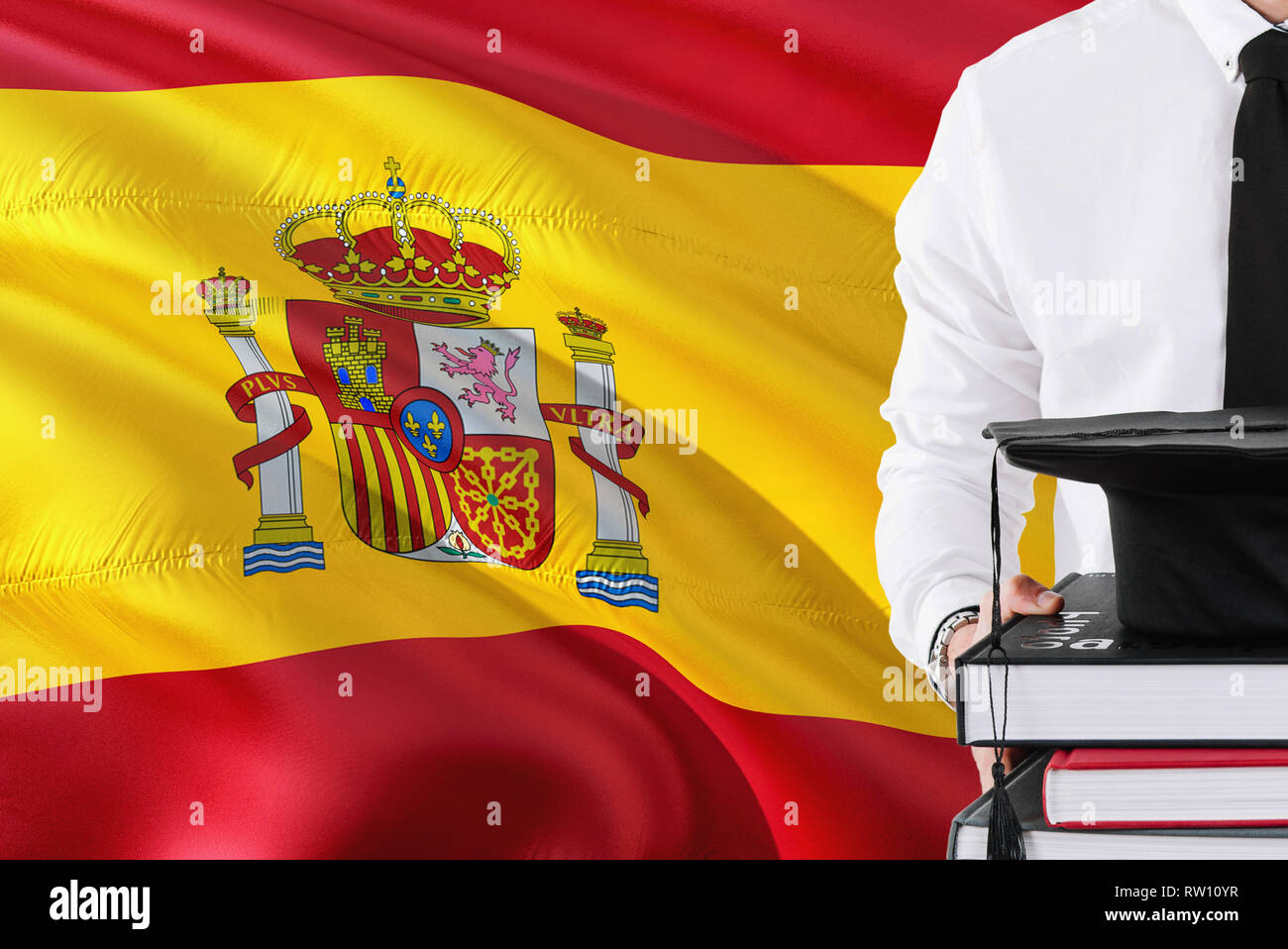 Successful Spanish student education concept. Holding books and ...